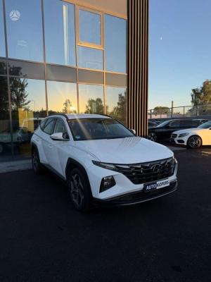 White Hyundai Tucson 2021 in Kaunas, with an engine capacity of 1.60 L and mileage of 181 thousand km for 18500 €, photo  on AUTOMOTO.COM.LV