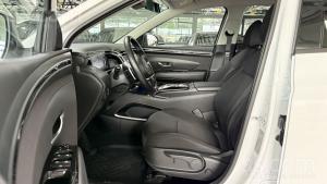 White Hyundai Tucson 2021 in Riga, with an engine capacity of 1.60 L and mileage of 50 thousand km for 23900 €, photo 11 on AUTOMOTO.COM.LV