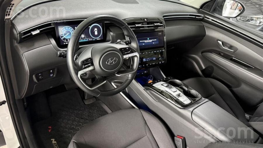 White Hyundai Tucson 2021 in Riga, with an engine capacity of 1.60 L and mileage of 50 thousand km for 23900 €, photo 12 on AUTOMOTO.COM.LV