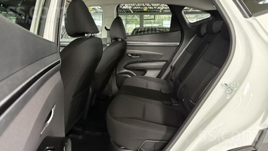White Hyundai Tucson 2021 in Riga, with an engine capacity of 1.60 L and mileage of 50 thousand km for 23900 €, photo 13 on AUTOMOTO.COM.LV