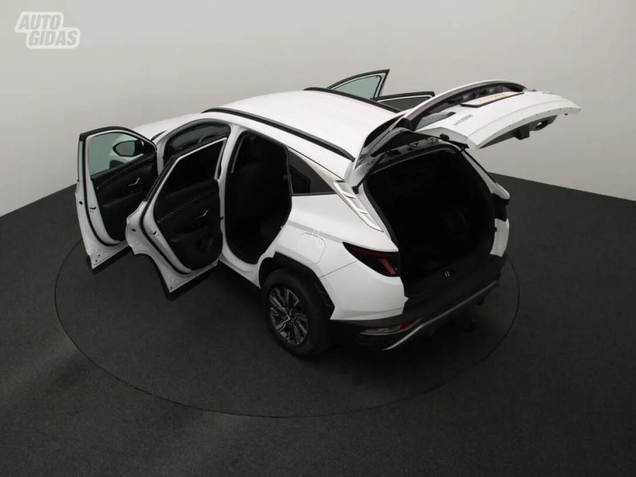 White Hyundai Tucson 2022 in Vilnius, with an engine capacity of 1.60 L and mileage of 156 thousand km for 20799 €, photo 14 on AUTOMOTO.COM.LV