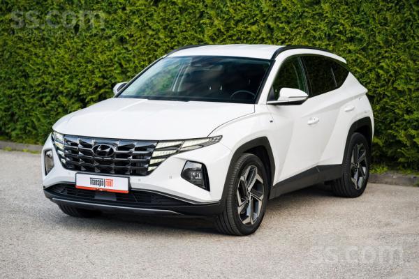 White Hyundai Tucson 2022 in Riga, with an engine capacity of 1.60 L and mileage of 78 thousand km for 21500 €, photo 1 on AUTOMOTO.COM.LV