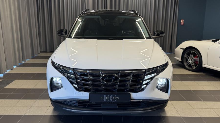 White Hyundai Tucson 2022 in Riga, with an engine capacity of 1.60 L and mileage of 46 thousand km for 26990 €, photo 9 on AUTOMOTO.COM.LV