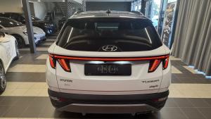 White Hyundai Tucson 2022 in Riga, with an engine capacity of 1.60 L and mileage of 46 thousand km for 26990 €, photo 10 on AUTOMOTO.COM.LV