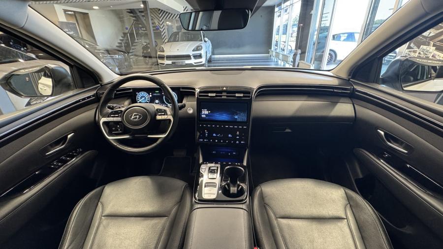 White Hyundai Tucson 2022 in Riga, with an engine capacity of 1.60 L and mileage of 46 thousand km for 26990 €, photo 15 on AUTOMOTO.COM.LV