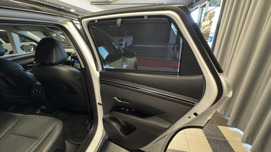 White Hyundai Tucson 2022 in Riga, with an engine capacity of 1.60 L and mileage of 46 thousand km for 26990 €, photo 17 on AUTOMOTO.COM.LV