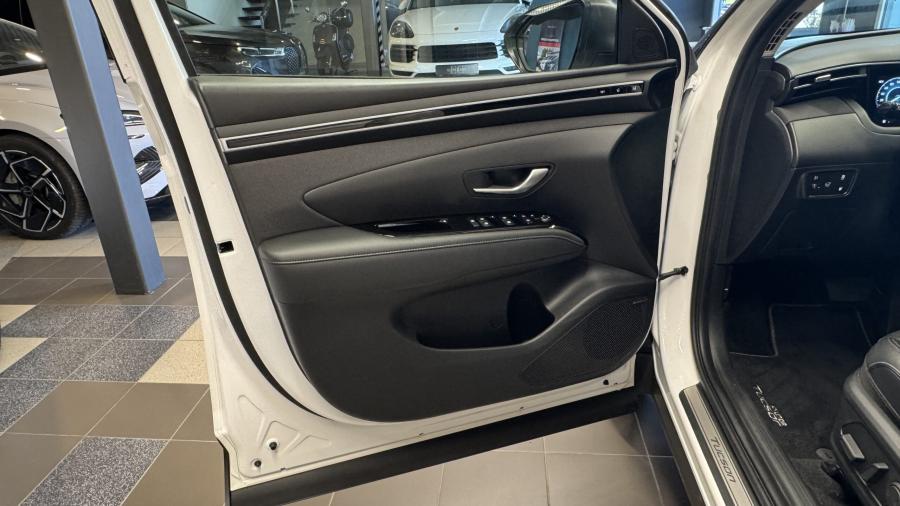 White Hyundai Tucson 2022 in Riga, with an engine capacity of 1.60 L and mileage of 46 thousand km for 26990 €, photo 19 on AUTOMOTO.COM.LV