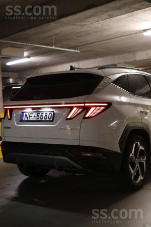White Hyundai Tucson 2022 in Riga, with an engine capacity of 1.60 L and mileage of 73 thousand km for 21500 €, photo 1 on AUTOMOTO.COM.LV