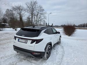 White Hyundai Tucson 2023 in Riga, with an engine capacity of 1.60 L and mileage of 70 thousand km for 25499 €, photo 3 on AUTOMOTO.COM.LV