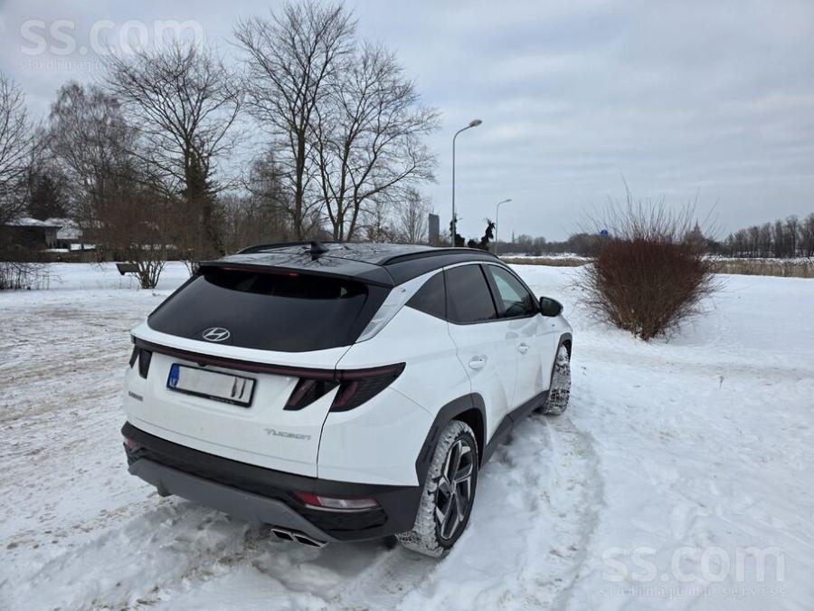 White Hyundai Tucson 2023 in Riga, with an engine capacity of 1.60 L and mileage of 70 thousand km for 25499 €, photo 3 on AUTOMOTO.COM.LV