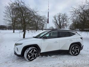 White Hyundai Tucson 2023 in Riga, with an engine capacity of 1.60 L and mileage of 70 thousand km for 25499 €, photo 6 on AUTOMOTO.COM.LV