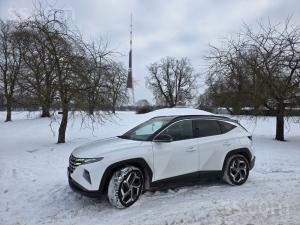 White Hyundai Tucson 2023 in Riga, with an engine capacity of 1.60 L and mileage of 70 thousand km for 25499 €, photo 7 on AUTOMOTO.COM.LV