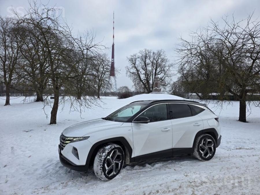 White Hyundai Tucson 2023 in Riga, with an engine capacity of 1.60 L and mileage of 70 thousand km for 25499 €, photo 7 on AUTOMOTO.COM.LV