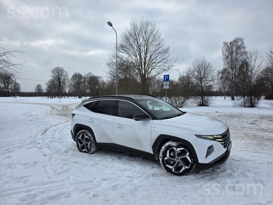 White Hyundai Tucson 2023 in Riga, with an engine capacity of 1.60 L and mileage of 70 thousand km for 25499 €, photo 8 on AUTOMOTO.COM.LV