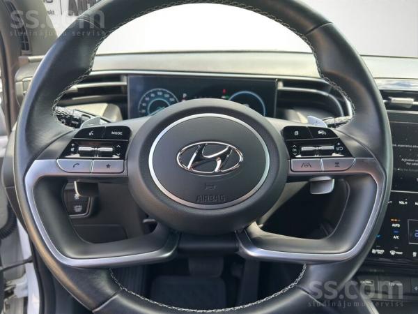 White Hyundai Tucson 2023 in Riga, with an engine capacity of 1.60 L and mileage of 72 thousand km for 27490 €, photo 10 on AUTOMOTO.COM.LV