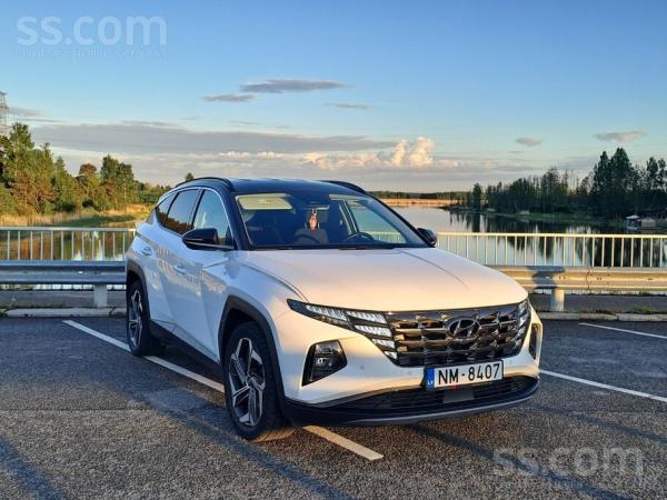 White Hyundai Tucson 2023 in Riga, with an engine capacity of 1.60 L and mileage of 78 thousand km for 24500 €, photo 2 on AUTOMOTO.COM.LV