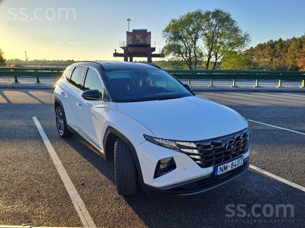 White Hyundai Tucson 2023 in Riga, with an engine capacity of 1.60 L and mileage of 78 thousand km for 24500 €, photo 3 on AUTOMOTO.COM.LV