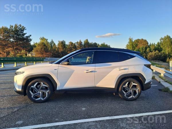 White Hyundai Tucson 2023 in Riga, with an engine capacity of 1.60 L and mileage of 78 thousand km for 24500 €, photo 5 on AUTOMOTO.COM.LV