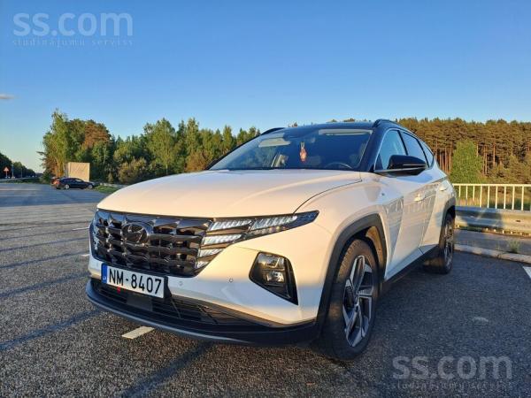 White Hyundai Tucson 2023 in Riga, with an engine capacity of 1.60 L and mileage of 78 thousand km for 24500 €, photo 6 on AUTOMOTO.COM.LV