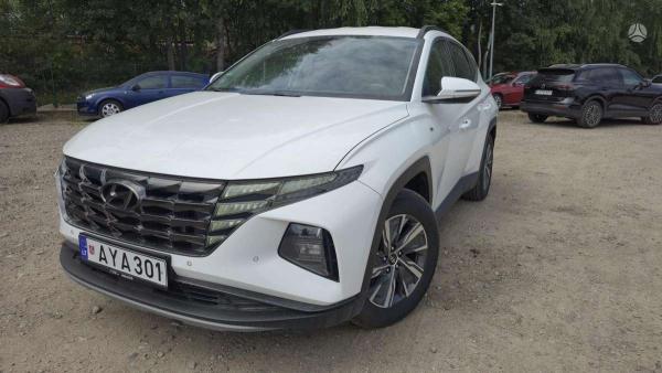 White Hyundai Tucson 2023 in Kaunas, with an engine capacity of 1.60 L and mileage of 128 thousand km for 17787 €, photo 1 on AUTOMOTO.COM.LV