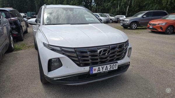White Hyundai Tucson 2023 in Kaunas, with an engine capacity of 1.60 L and mileage of 128 thousand km for 17787 €, photo 2 on AUTOMOTO.COM.LV