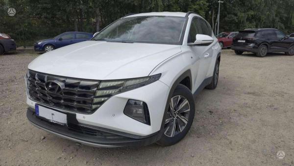 White Hyundai Tucson 2023 in Kaunas, with an engine capacity of 1.60 L and mileage of 128 thousand km for 17787 €, photo 1 on AUTOMOTO.COM.LV