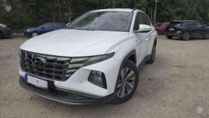 White Hyundai Tucson 2023 in Kaunas, with an engine capacity of 1.60 L and mileage of 128 thousand km for 17787 €, photo  on AUTOMOTO.COM.LV