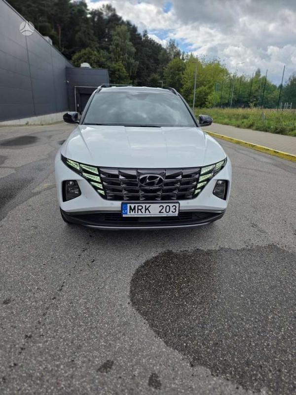 White Hyundai Tucson 2023 in Vilnius, with an engine capacity of 1.60 L and mileage of 55 thousand km for 27600 €, photo 1 on AUTOMOTO.COM.LV