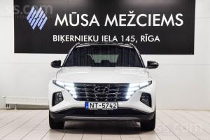 White Hyundai Tucson 2024 in Riga, with an engine capacity of 1.60 L and mileage of 107 thousand km for 25990 €, photo 3 on AUTOMOTO.COM.LV