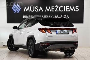 White Hyundai Tucson 2024 in Riga, with an engine capacity of 1.60 L and mileage of 107 thousand km for 25990 €, photo 7 on AUTOMOTO.COM.LV