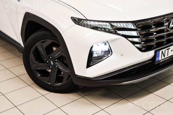 Hyundai Tucson 2024 Rīga vietnē Balts Hyundai Tucson 2024 Rīga, ar dzinēja tilpumu 1.60 L un nobraukumu 107 tūkst. km par 25990 €, foto 10 vietnē AUTOMOTO.COM.LV