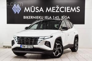 White Hyundai Tucson 2024 in Riga, with an engine capacity of 1.60 L and mileage of 84 thousand km for 26490 €, photo  on AUTOMOTO.COM.LV