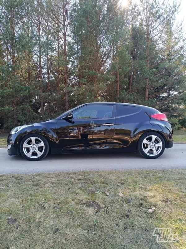 Black Hyundai Veloster 2012 in Panevezys, with an engine capacity of 1.60 L and mileage of 176 thousand km for 5100 €, photo 5 on AUTOMOTO.COM.LV