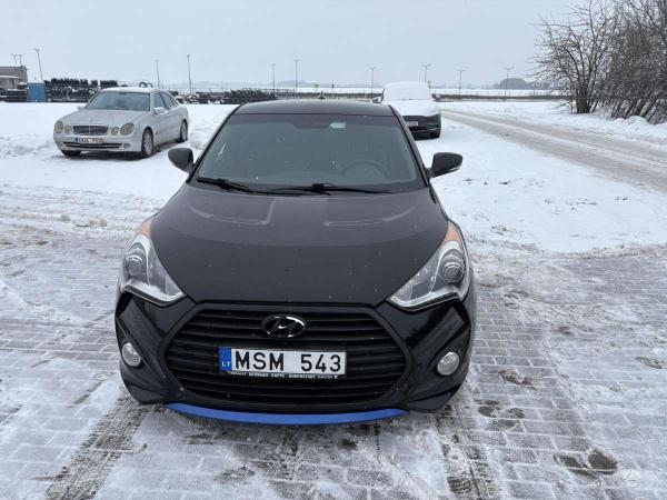 Black Hyundai Veloster 2013 in Kaunas, with an engine capacity of 1.59 L and mileage of 133 thousand km for 4900 €, photo 2 on AUTOMOTO.COM.LV