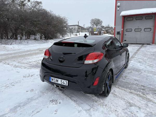 Black Hyundai Veloster 2013 in Kaunas, with an engine capacity of 1.59 L and mileage of 133 thousand km for 4900 €, photo 5 on AUTOMOTO.COM.LV