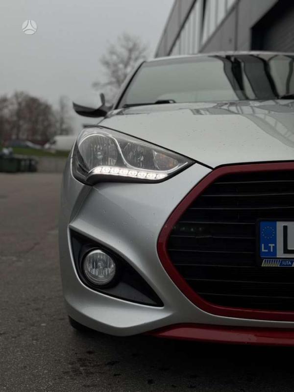 Grey Hyundai Veloster 2016 in Klaipeda, with an engine capacity of 1.59 L and mileage of 100 thousand km for 8800 €, photo 9 on AUTOMOTO.COM.LV