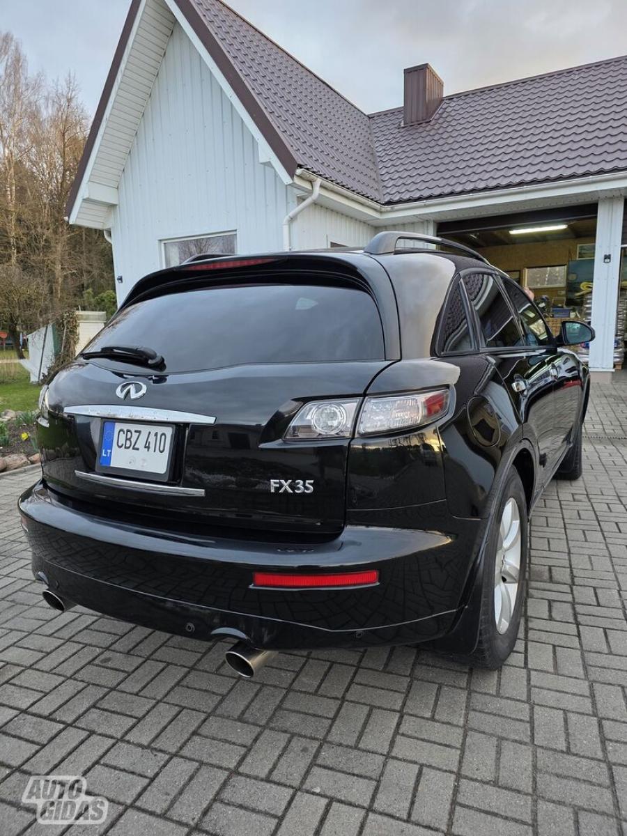 Melns Infiniti FX 35 2005 Plungė, ar dzinēja tilpumu 3.50 L un nobraukumu 198 tūkst. km par 4100 €, foto 5 vietnē AUTOMOTO.COM.LV