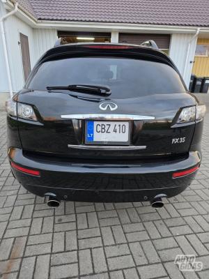 Melns Infiniti FX 35 2005 Plungė, ar dzinēja tilpumu 3.50 L un nobraukumu 198 tūkst. km par 4100 €, foto 13 vietnē AUTOMOTO.COM.LV