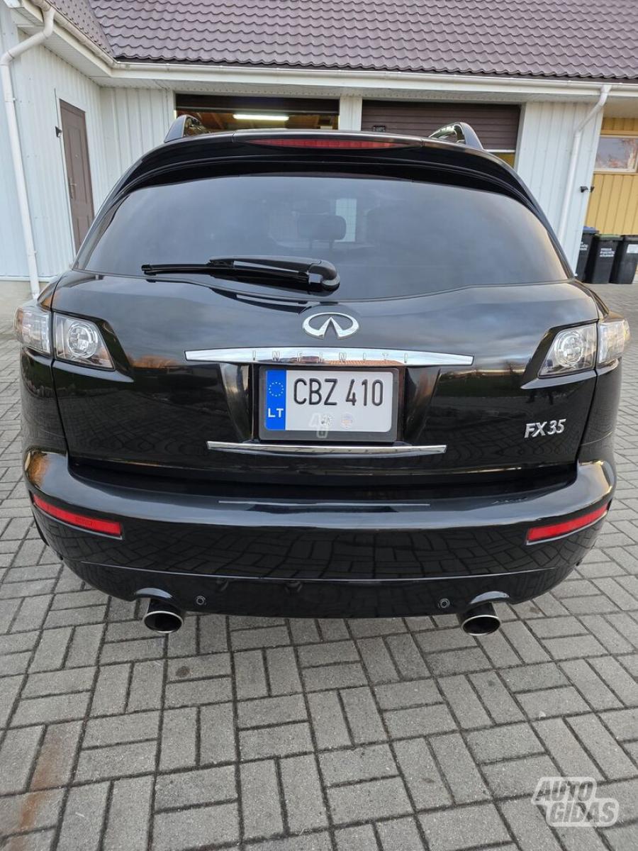 Melns Infiniti FX 35 2005 Plungė, ar dzinēja tilpumu 3.50 L un nobraukumu 198 tūkst. km par 4100 €, foto 13 vietnē AUTOMOTO.COM.LV