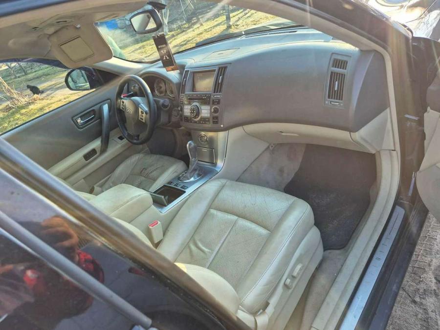 Melns Infiniti FX 35 2006 Kelmė, ar dzinēja tilpumu 3.50 L un nobraukumu 200 tūkst. km par 1999 €, foto 11 vietnē AUTOMOTO.COM.LV