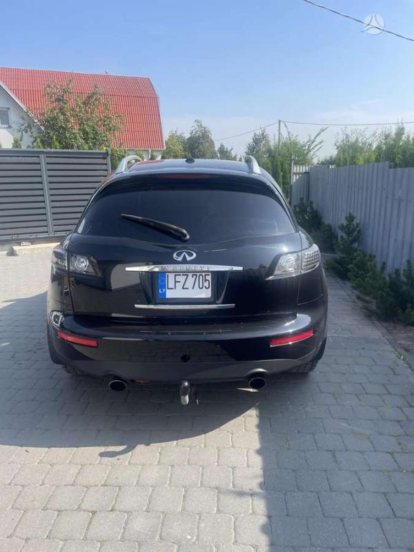 Black Infiniti FX 35 2008 in Jonava, with an engine capacity of 3.50 L and mileage of 210 thousand km for 4300 €, photo 4 on AUTOMOTO.COM.LV
