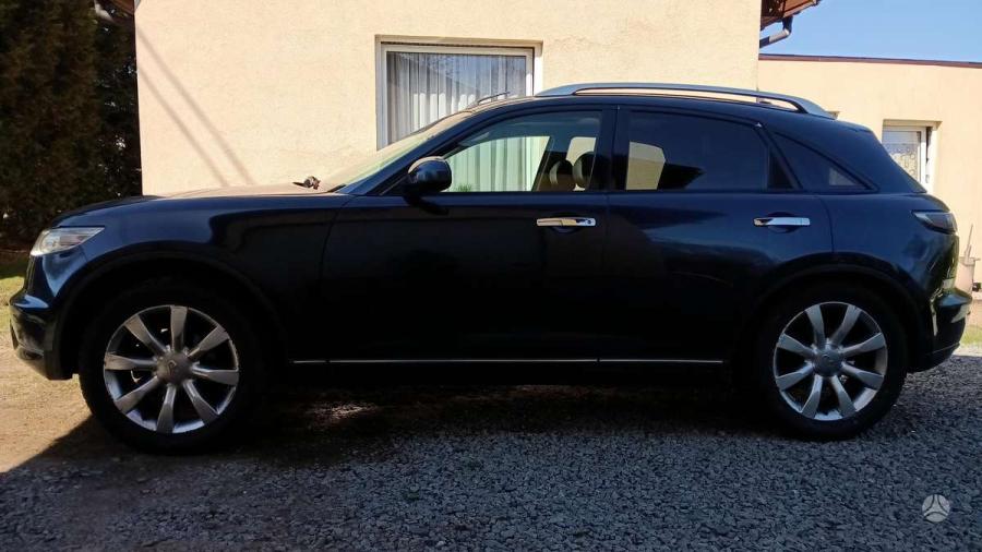 Blue Infiniti FX 35 2005 in Vilnius, with an engine capacity of 3.50 L and mileage of 346 thousand km for 3700 €, photo 9 on AUTOMOTO.COM.LV