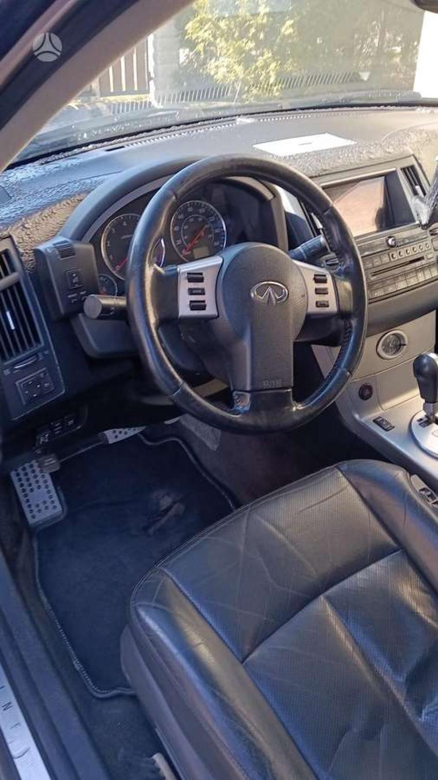 Blue Infiniti FX 35 2005 in Vilnius, with an engine capacity of 3.50 L and mileage of 346 thousand km for 3700 €, photo 16 on AUTOMOTO.COM.LV