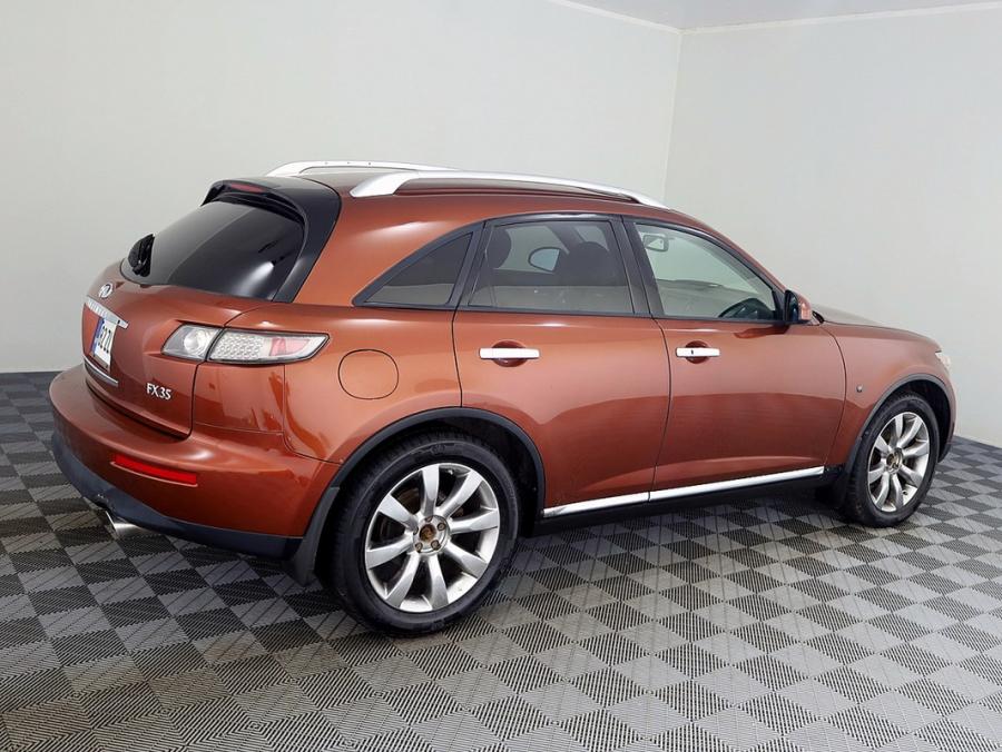 Brown Infiniti FX 35 2006 in Tallinn, with an engine capacity of 3.50 L and mileage of 132 thousand km for 1799 €, photo 4 on AUTOMOTO.COM.LV