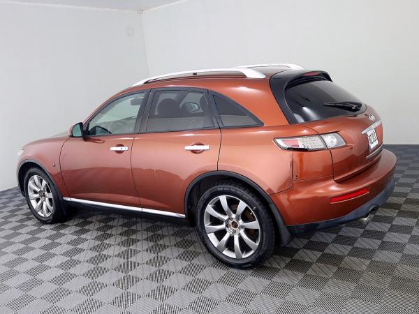 Brown Infiniti FX 35 2006 in Tallinn, with an engine capacity of 3.50 L and mileage of 132 thousand km for 1799 €, photo 4 on AUTOMOTO.COM.LV