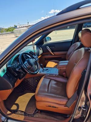 Brown Infiniti FX 2003 in Riga, with an engine capacity of 3.50 L and mileage of 243 thousand km for 5400 €, photo 10 on AUTOMOTO.COM.LV