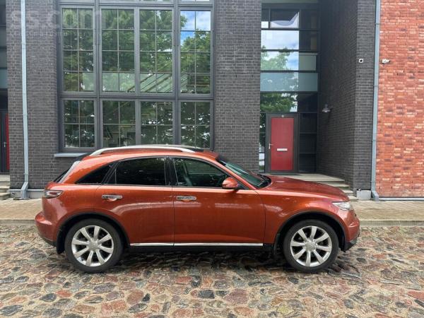 Brown Infiniti FX 2007 in Riga, with an engine capacity of 3.50 L and mileage of 290 thousand km for 3350 €, photo 2 on AUTOMOTO.COM.LV