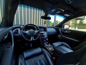 Brown Infiniti FX 2012 in Riga, with an engine capacity of 3.00 L and mileage of 227 thousand km for 14500 €, photo 11 on AUTOMOTO.COM.LV