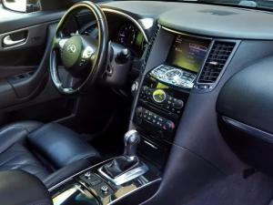 Brown Infiniti FX 2012 in Riga, with an engine capacity of 3.00 L and mileage of 227 thousand km for 14500 €, photo 15 on AUTOMOTO.COM.LV