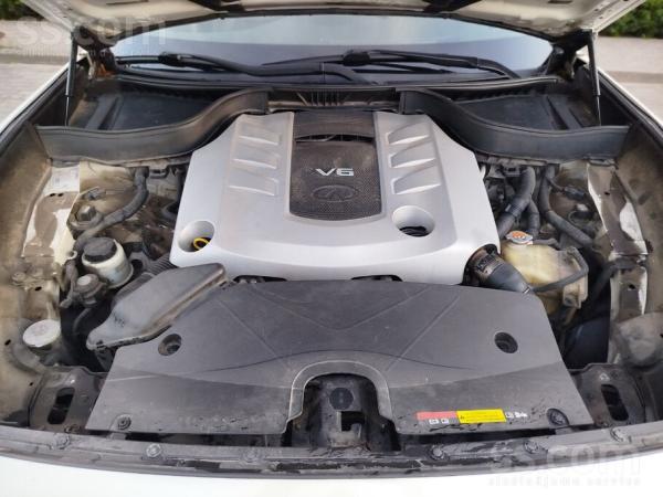 White Infiniti FX 2014 in Riga, with an engine capacity of 3.00 L and mileage of 246 thousand km for 9900 €, photo 8 on AUTOMOTO.COM.LV